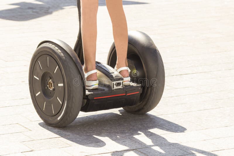 Children`s Feet on an Electric Scooter Stock Photo - Image of balance ...