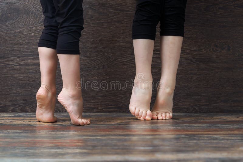 Children`s Feet on Floor Standing on Tiptoe Stock Image - Image of ...