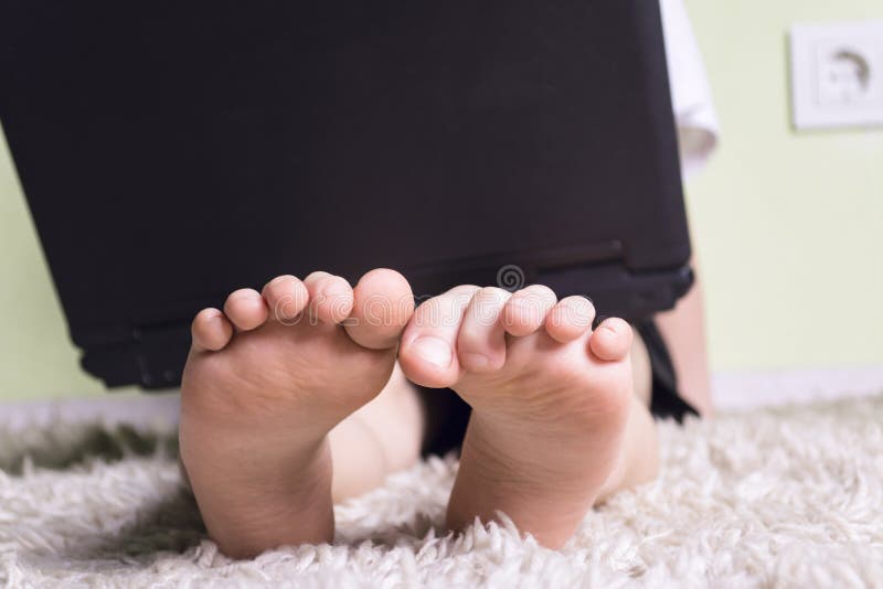Children& X27;s Feet and Laptop Stock Photo - Image of child, computer ...