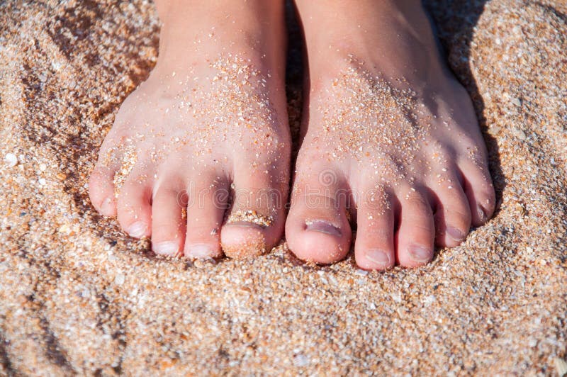Children`s Feet in the Sand on the Beach. White Stock Photo - Image of ...