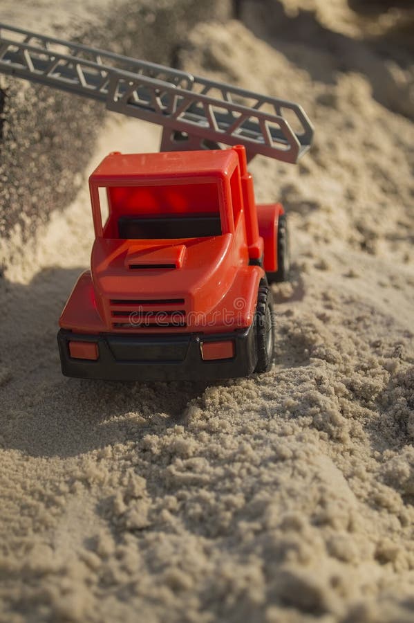 Children& X27;s Fire Truck on the Sand Stock Image - Image of sand ...