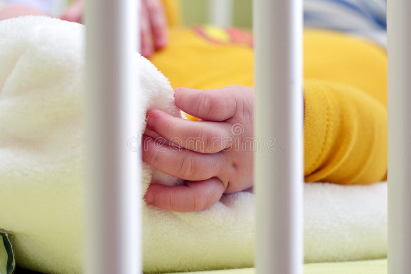 Children S Hand in the Crib Stock Photo - Image of house, happy: 50797962