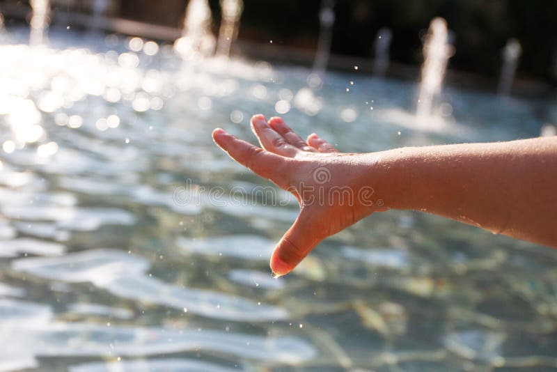 Children s hand with drops stock image. Image of palm - 72235179