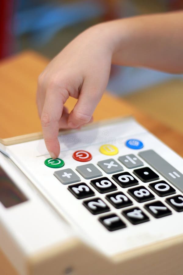 Children`s Hand Presses on Button Calculator Stock Image - Image of ...