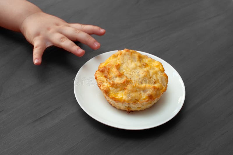 Children`s Hand Reaches for Fish Muffin Stock Photo - Image of ...
