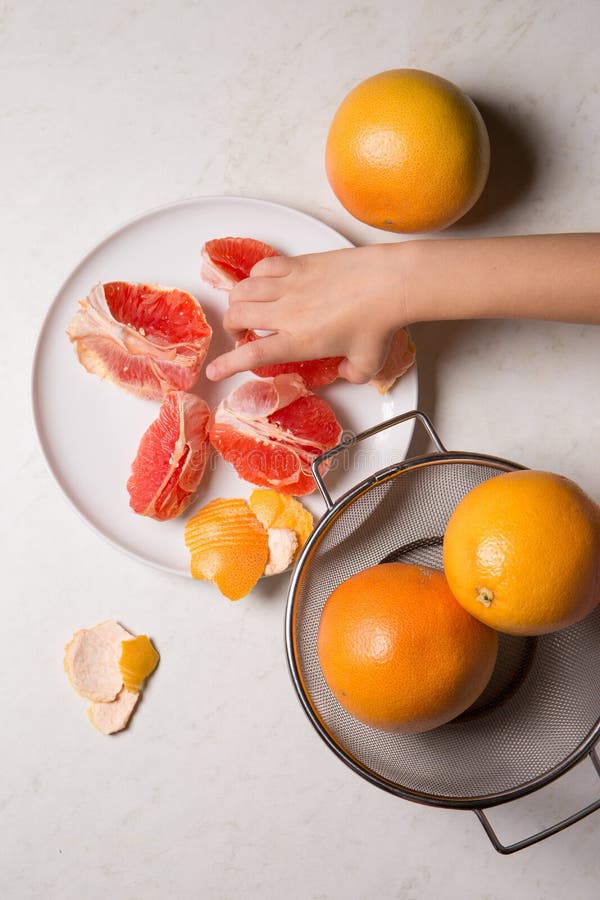 Children`s Hand Takes a Grapefruit Stock Image - Image of health, fresh ...
