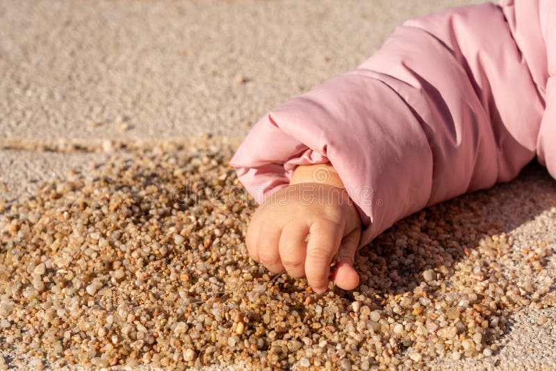 Children`s Hand Takes a Handful of Sand Stock Photo - Image of natural ...