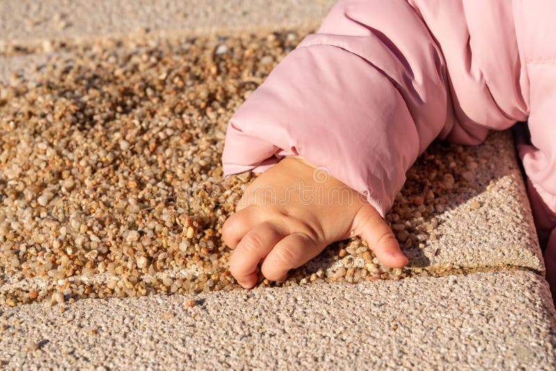 Children`s Hand Takes a Handful of Sand Stock Image - Image of cute ...