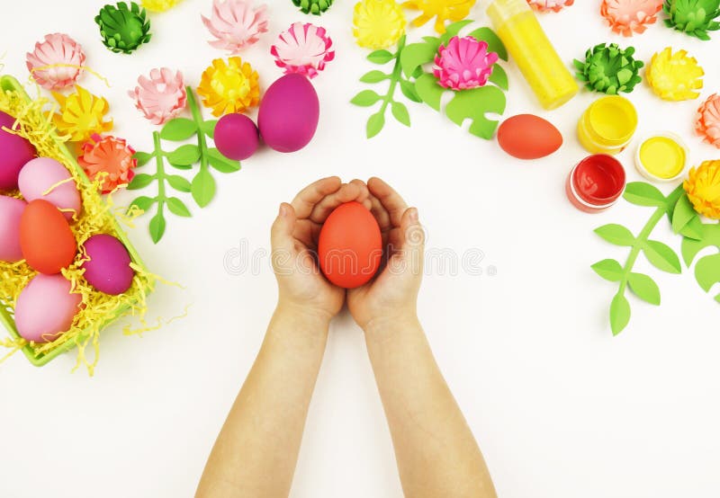 Children`s Hands Hold an Easter Egg. Easter. Spring. Children`s ...