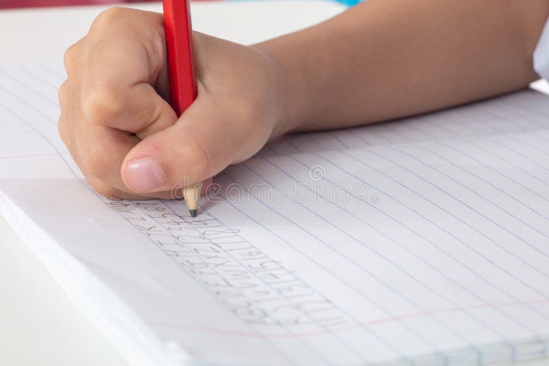 Children`s Hands Holding Pencil and Doing Homework Stock Image - Image ...