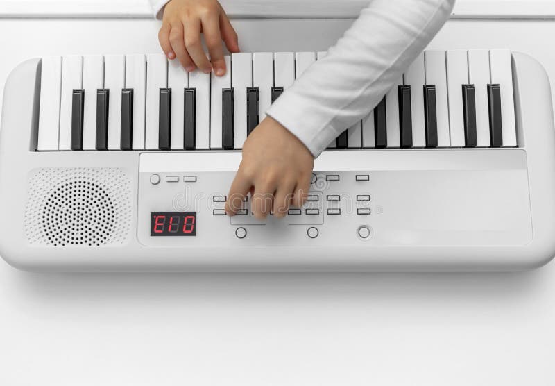 Children S Hands on the Keys of the Synthesizer. Stock Photo - Image of ...