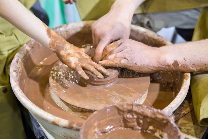 Children`s Hands Make a Mold of Clay. Pottery Stock Image - Image of ...