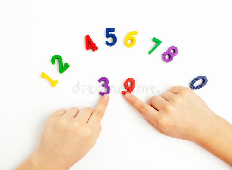 Children& X27;s Hands Move Numbers on a White Table. Learning Colors ...