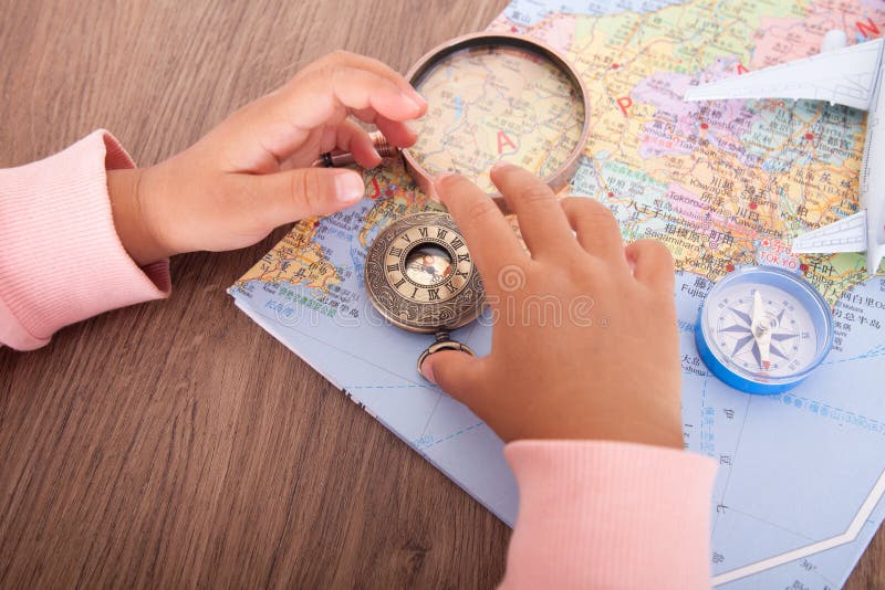 Children`s Hands Playing with Various Objects on the Map Stock Image ...