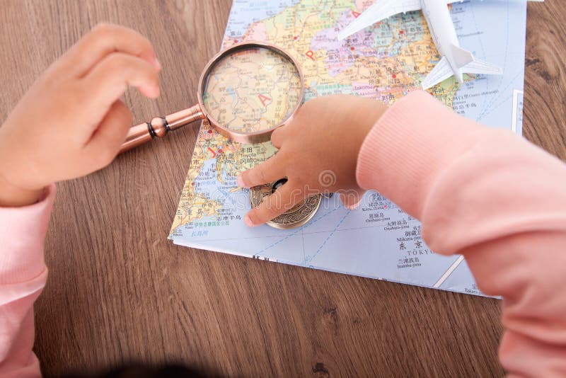 Children`s Hands Playing with Various Objects on the Map Stock Image ...