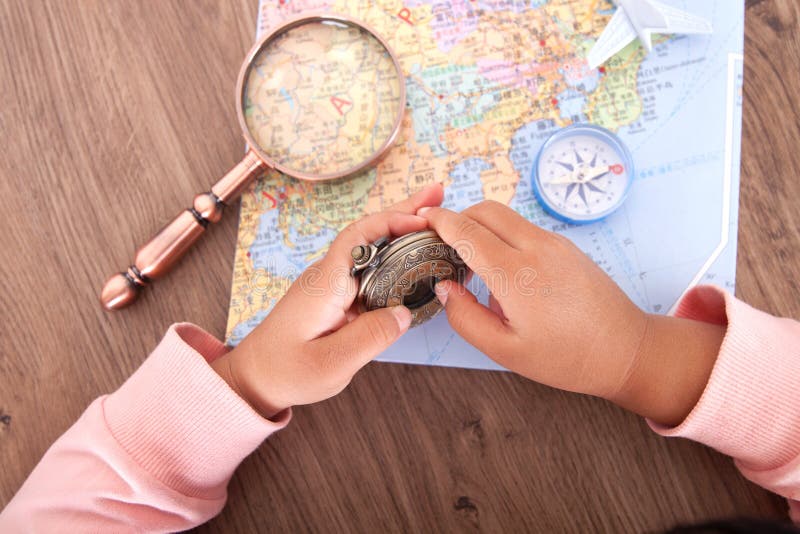 Children`s Hands are Playing with Various Objects on the Map of Japan ...