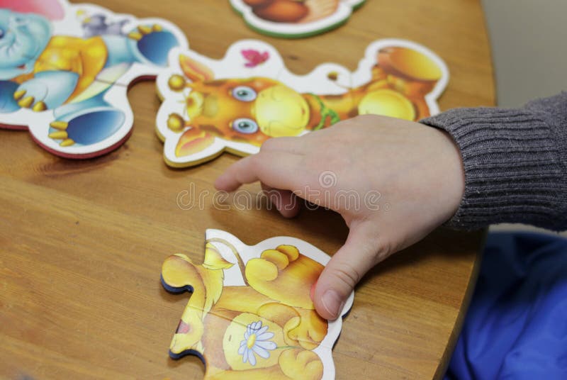 Children`s Hands Stack Game Puzzles Stock Photo - Image of color ...