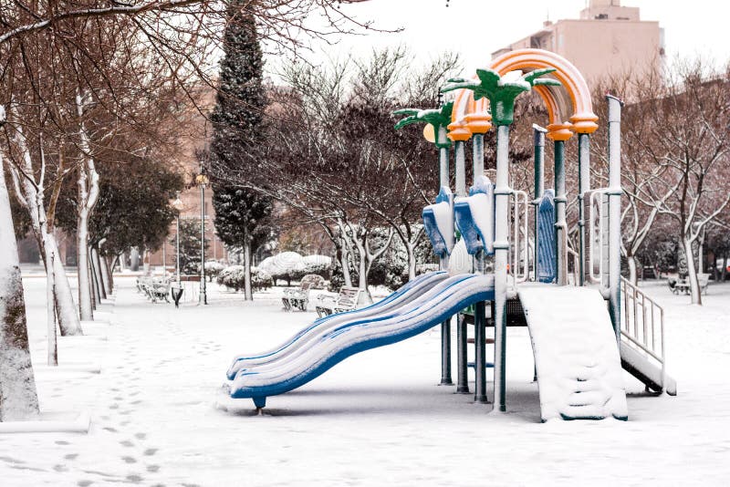 Playground in snow park stock image. Image of freshness - 65700323