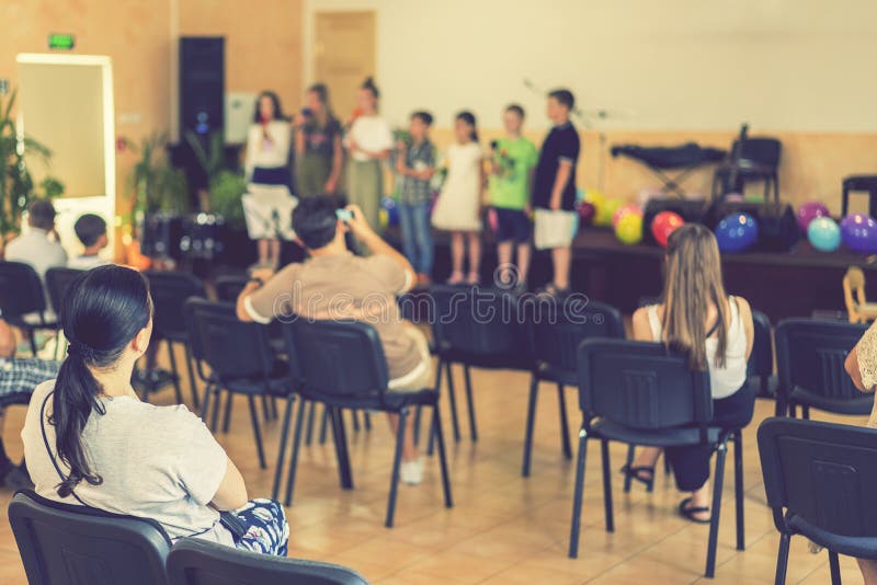 Children& X27;s Holiday in Elementary School. Children on Stage Perform ...