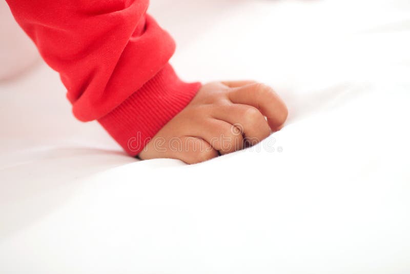 Children`s Little Hands on the Sheets Stock Photo - Image of hand ...