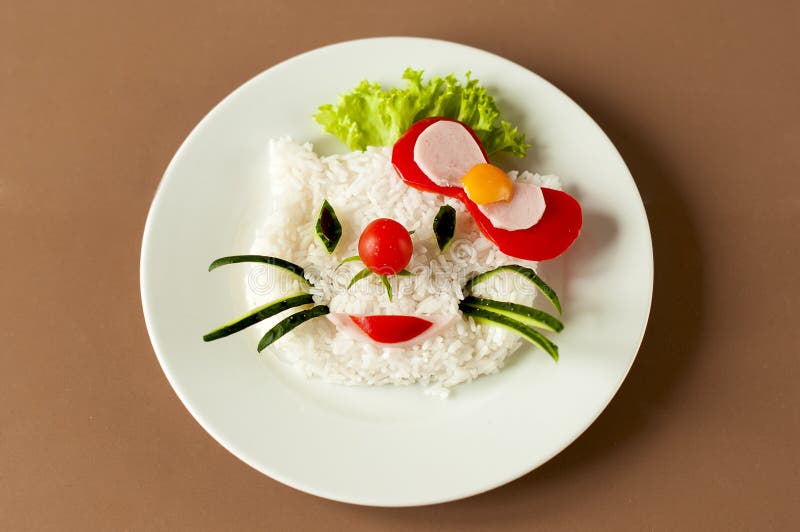 Children s meal with rice. stock photo. Image of figure - 58022648