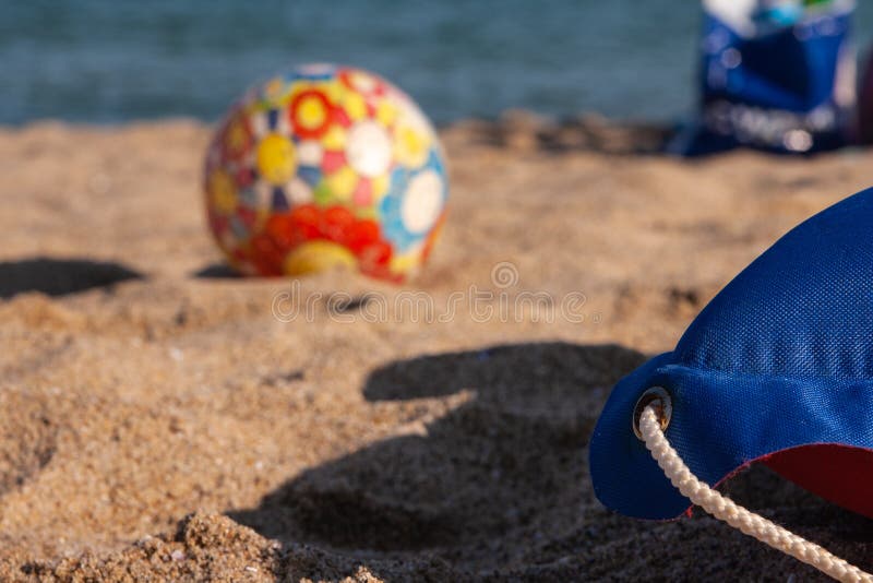 Children`s Multi-colored Ball on the Beach Stock Photo - Image of clear ...