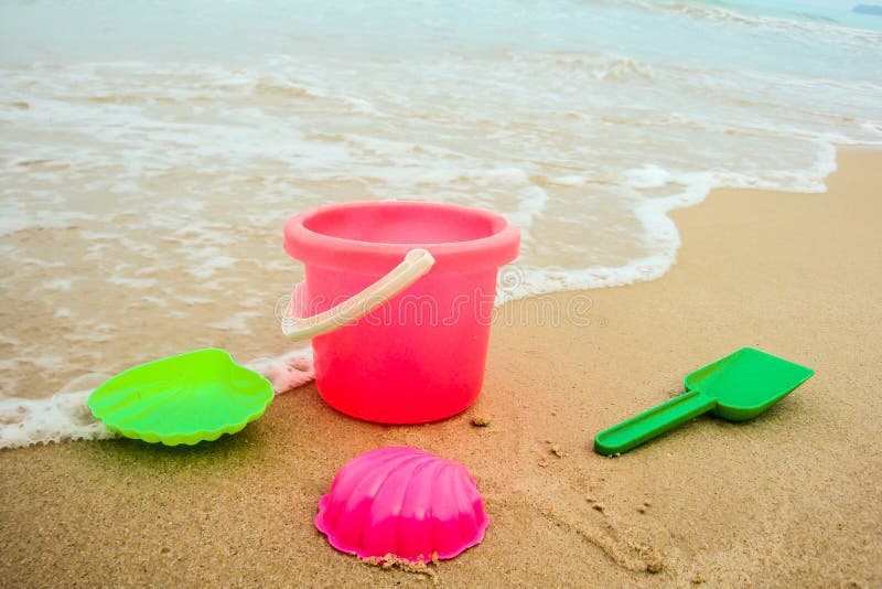 Children`s Pail and Colored Molds on the Beach in the Sand Stock Photo ...