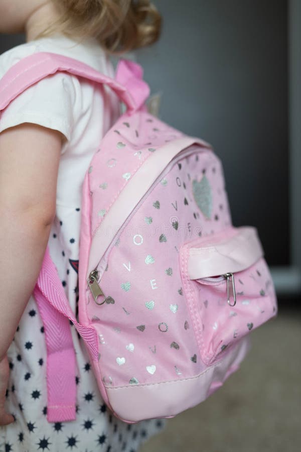CHILDREN`S PINK BACKPACK stock image. Image of standing - 149003383