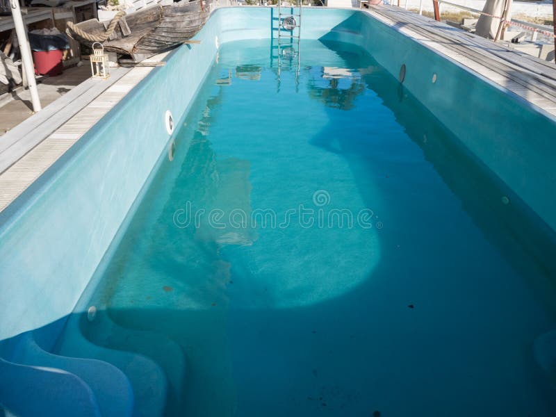 Children`s Plastic Blue Pool with Water Blue Stock Image - Image of ...
