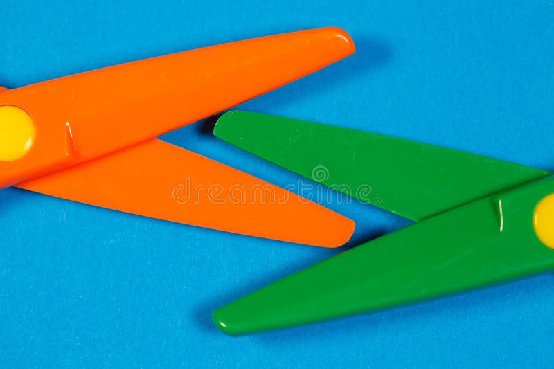 Children S Plastic Scissors for Cutting Paper Figures on a Colored ...