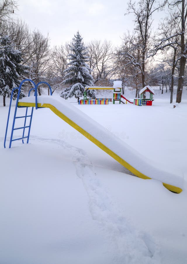 Children`s Playground Covered with Snow Stock Photo - Image of colorful ...
