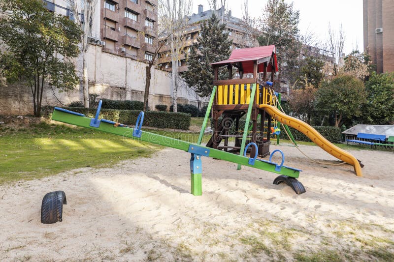 A Children S Playground with Slides, Sand on the Ground Stock Photo ...
