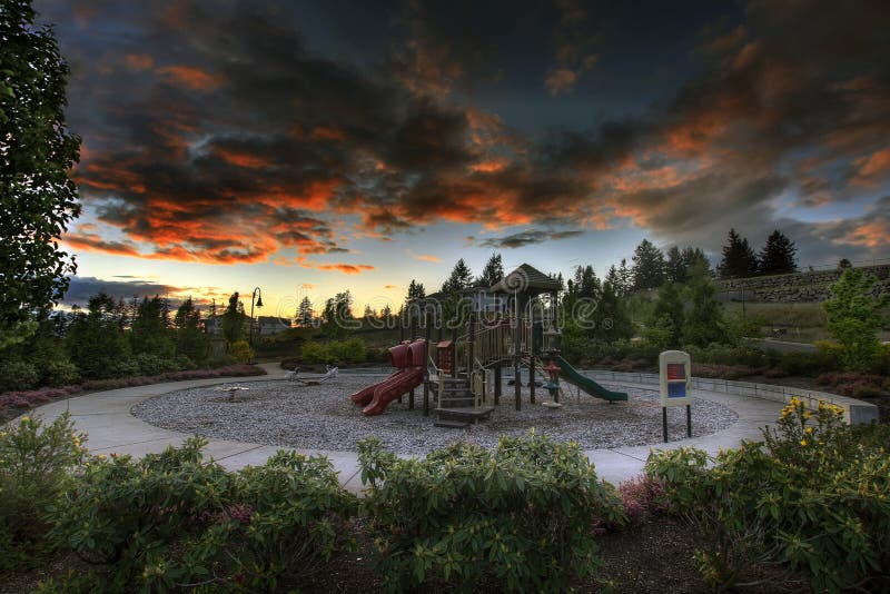 Children S Playground at Sunset 2 Stock Photo - Image of sunset, shrubs ...