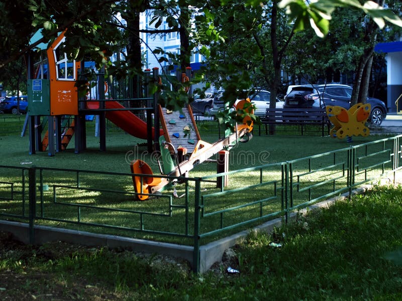 Children`s Playground among the Trees in the Morning Stock Image ...