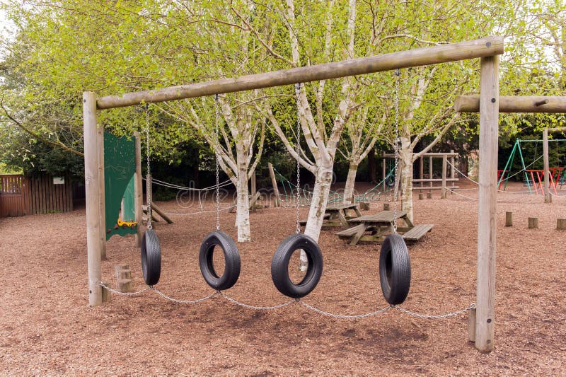 Playground Tire Bridge Swing Stock Image - Image of outdoors, aligned ...
