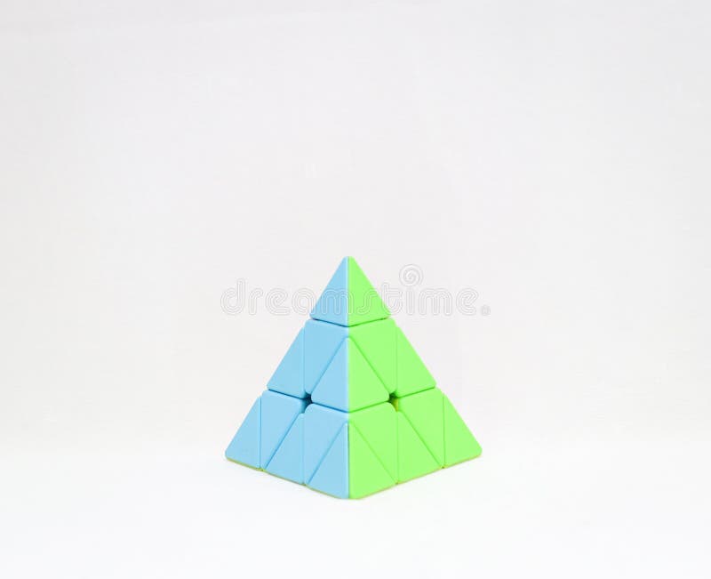 Children Pyramid Cube Puzzle Solved Stock Photo - Image of green ...