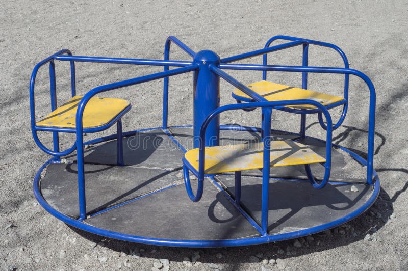 Children S Roundabout (merry-go-round) on the Playground. Stock Image ...