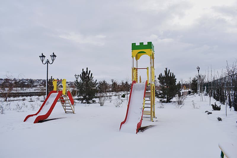The Children`s Slide is Covered with the First Snow Stock Image - Image ...