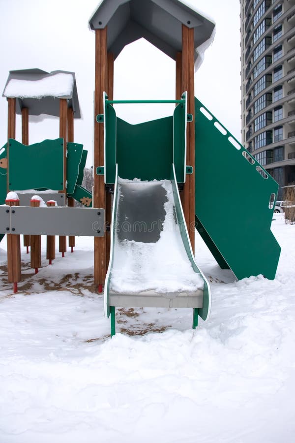 Children S Slide in the Snow Close Up Stock Photo - Image of covered ...