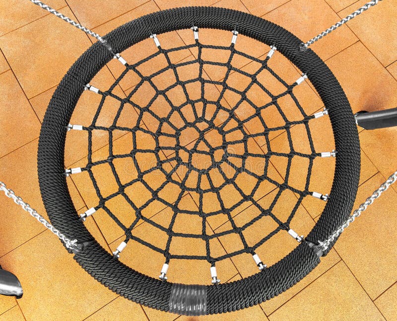 Children S Swing in the Form of a Web. Stock Image - Image of swing ...