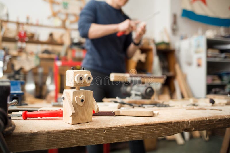A Robot Stands in Front of a Wall of Data, Processing Information for ...