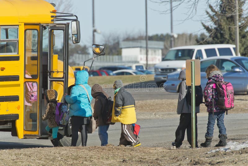 Children at the School Bus on a Cold Morning Editorial Stock Photo ...