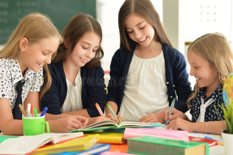 Children at School in Lessons Stock Photo - Image of adult, learner ...
