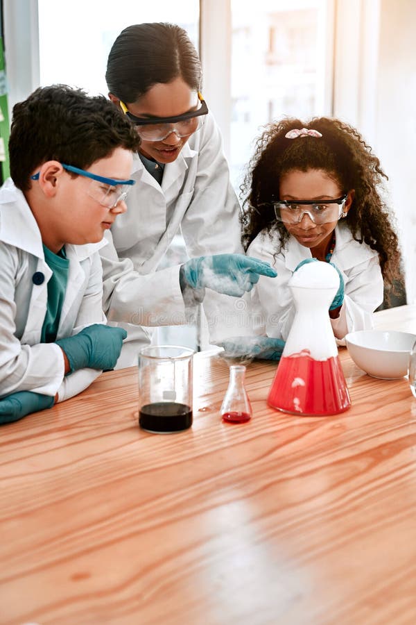 Children, Science Teacher and Experiment with Beaker for Learning ...