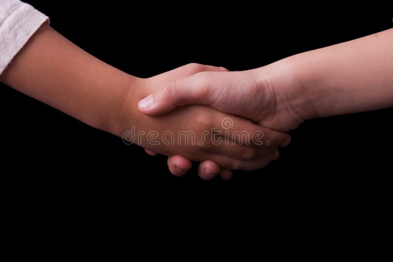 Children shaking hands stock photo. Image of friendship - 21989272