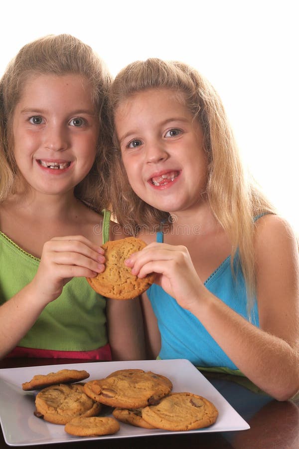 Children sharing popsicles stock photo. Image of love - 2322680