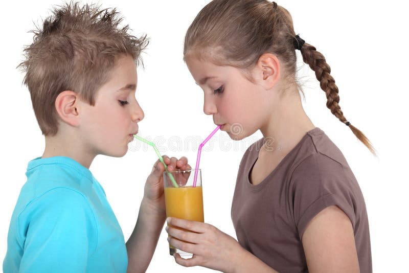 Children sharing juice stock image. Image of enjoyment - 28009833