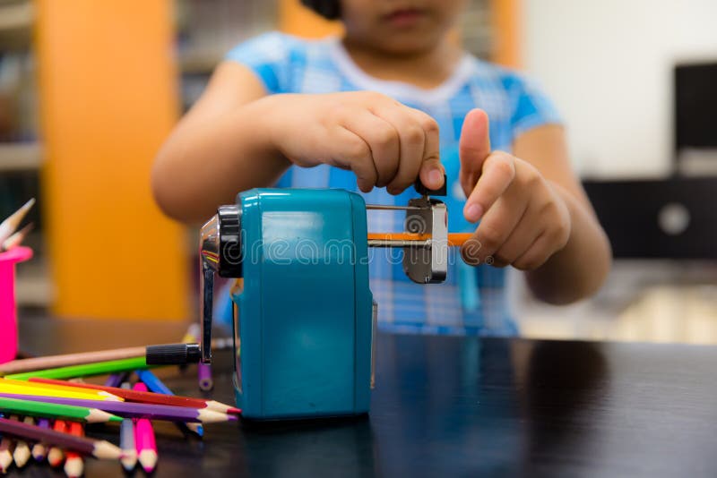 Children are Sharpening Crayons in the Library Stock Photo - Image of ...