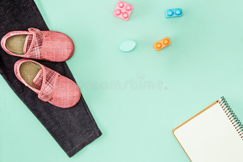 The Children Shoes and Notebook . Back To School Concept. Stock Image ...