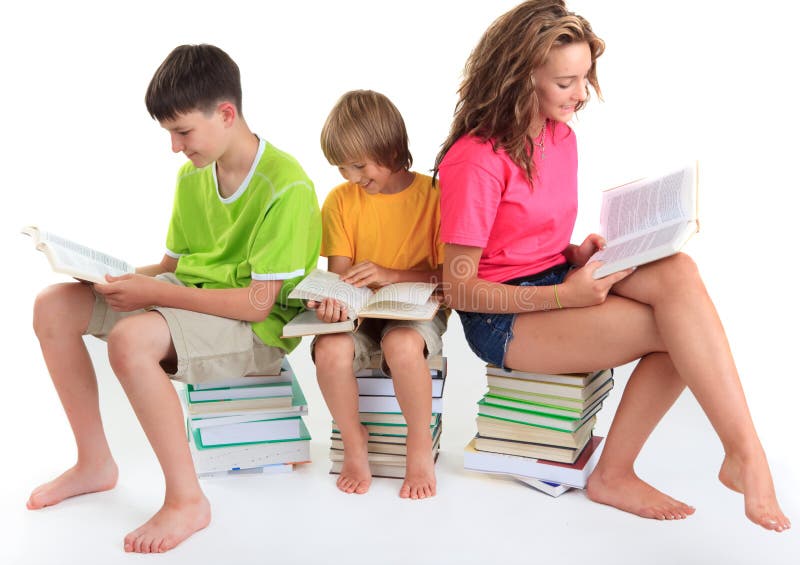 Children sitting on books stock photo. Image of read - 13570554
